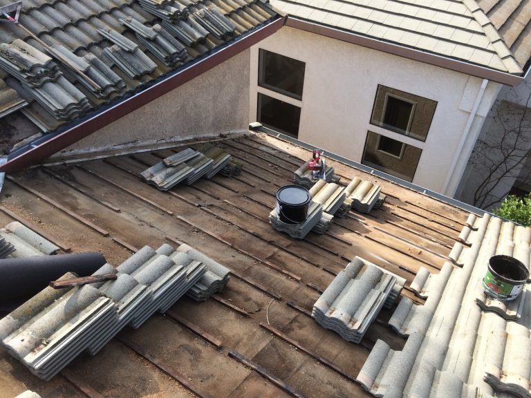 FAQ: What is a Lift and Re-lay and is it an option for me? - Eagle Roofing